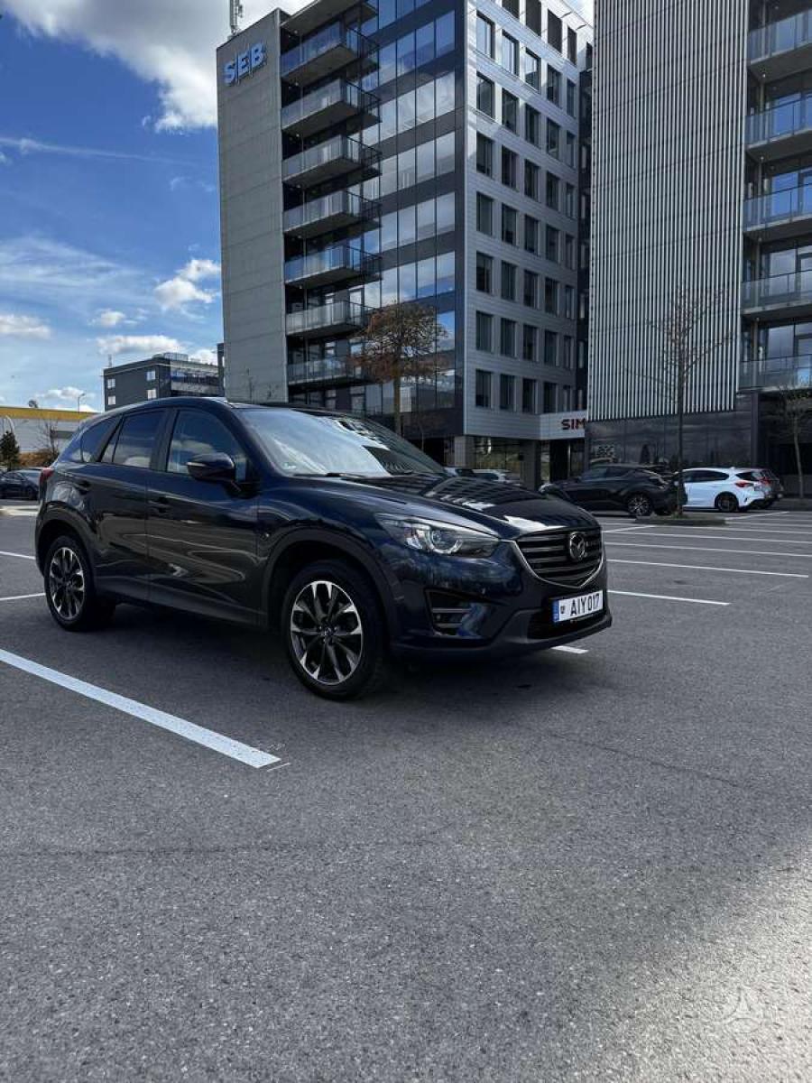 Black Mazda CX-5 2015 in Vilnius, with an engine capacity of 2.19 L and mileage of 219 thousand km for 10200 €, photo 1 on AUTOMOTO.COM.LV