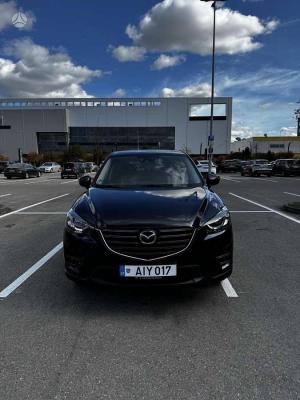 Black Mazda CX-5 2015 in Vilnius, with an engine capacity of 2.19 L and mileage of 219 thousand km for 10200 €, photo 3 on AUTOMOTO.COM.LV