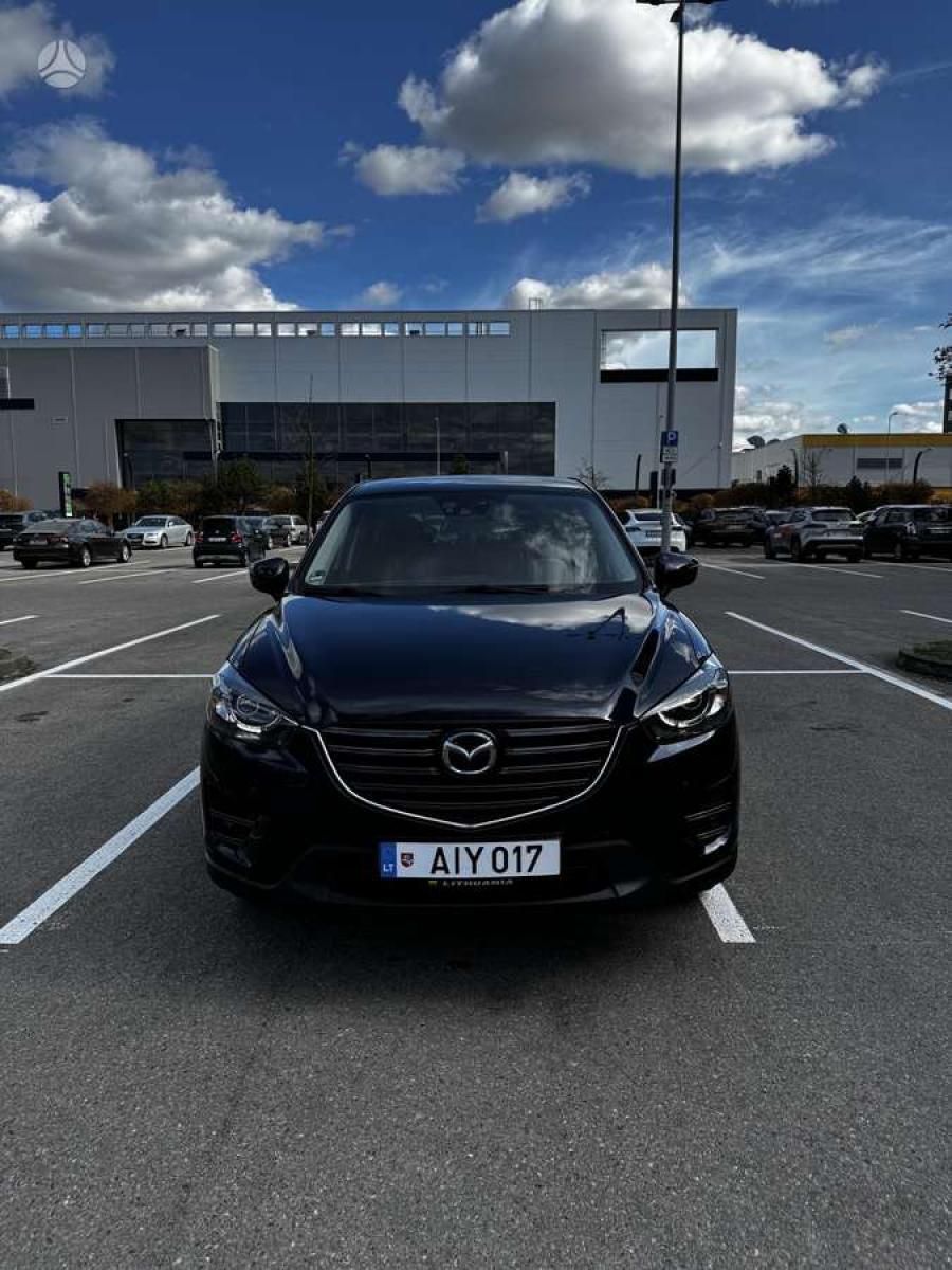 Black Mazda CX-5 2015 in Vilnius, with an engine capacity of 2.19 L and mileage of 219 thousand km for 10200 €, photo 3 on AUTOMOTO.COM.LV