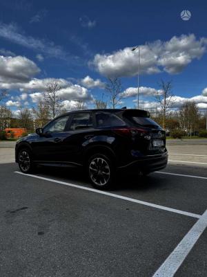 Black Mazda CX-5 2015 in Vilnius, with an engine capacity of 2.19 L and mileage of 219 thousand km for 10200 €, photo 6 on AUTOMOTO.COM.LV