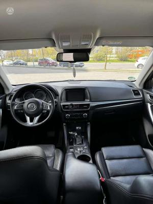 Black Mazda CX-5 2015 in Vilnius, with an engine capacity of 2.19 L and mileage of 219 thousand km for 10200 €, photo 12 on AUTOMOTO.COM.LV