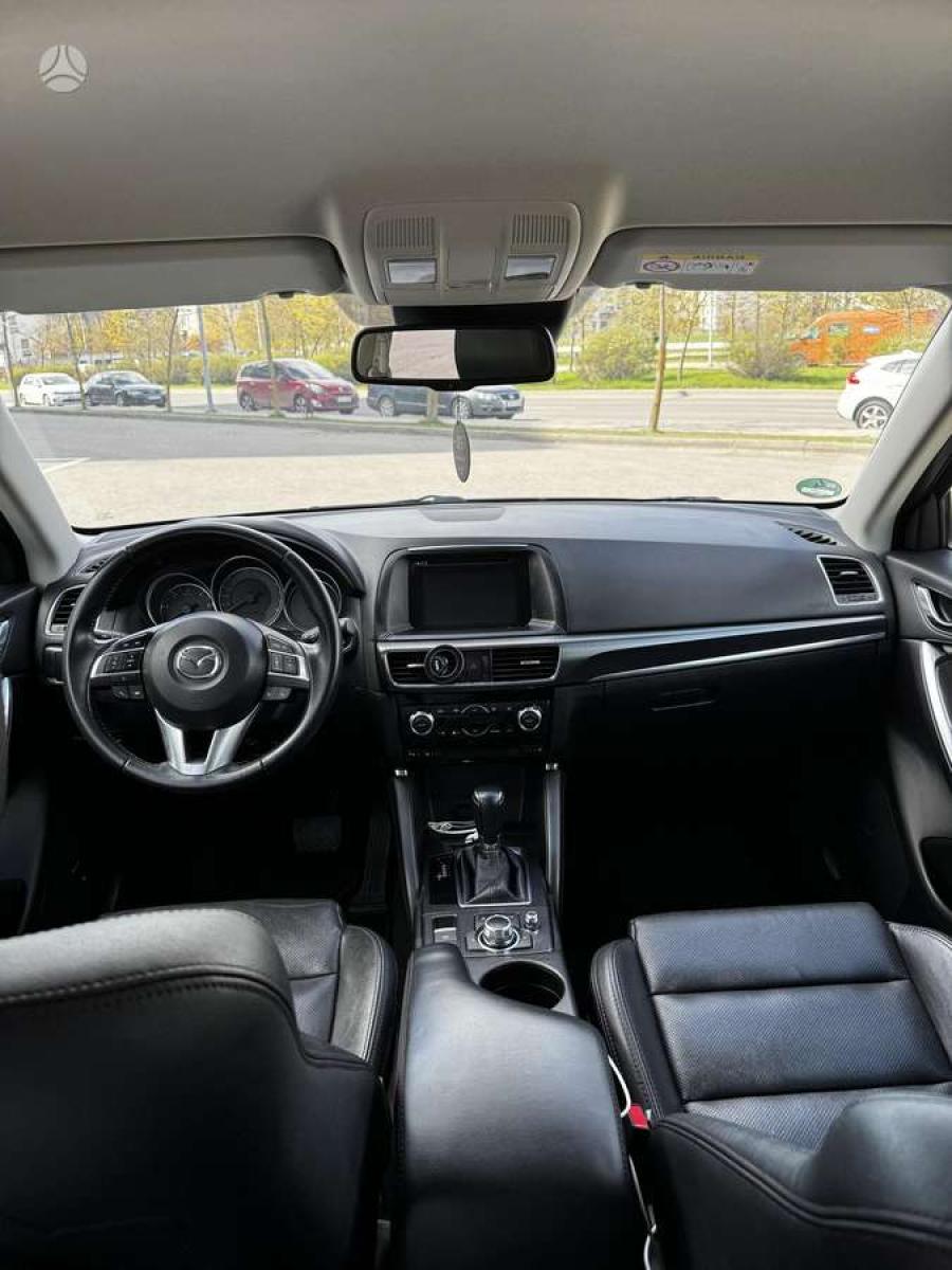 Black Mazda CX-5 2015 in Vilnius, with an engine capacity of 2.19 L and mileage of 219 thousand km for 10200 €, photo 12 on AUTOMOTO.COM.LV