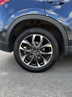 Black Mazda CX-5 2015 in Vilnius, with an engine capacity of 2.19 L and mileage of 219 thousand km for 10200 €, photo 21 on AUTOMOTO.COM.LV