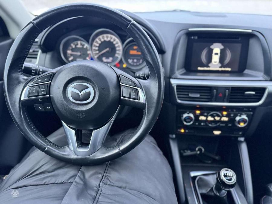 Black Mazda CX-5 2016 in Vilnius, with an engine capacity of 2.19 L and mileage of 15 thousand km for 9550 €, photo 12 on AUTOMOTO.COM.LV