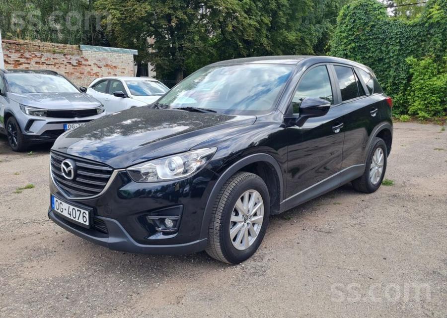 Black Mazda CX-5 2016 in Jelgava, with an engine capacity of 2.20 L and mileage of 0 thousand km for 8990 €, photo 4 on AUTOMOTO.COM.LV