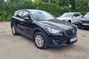 Black Mazda CX-5 2016 in Jelgava, with an engine capacity of 2.20 L and mileage of 0 thousand km for 8990 €, photo 5 on AUTOMOTO.COM.LV