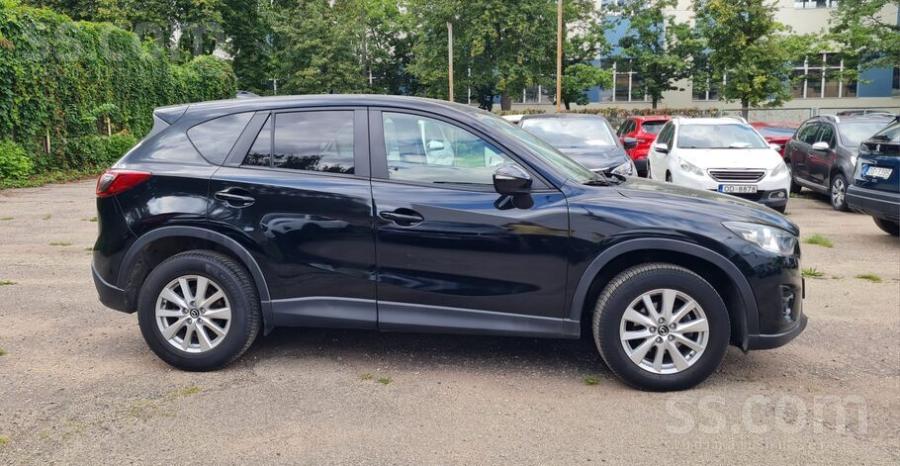 Black Mazda CX-5 2016 in Jelgava, with an engine capacity of 2.20 L and mileage of 0 thousand km for 8990 €, photo 6 on AUTOMOTO.COM.LV