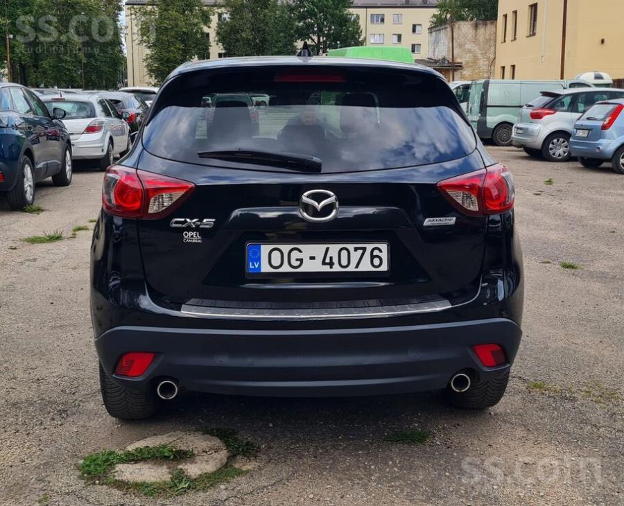 Black Mazda CX-5 2016 in Jelgava, with an engine capacity of 2.20 L and mileage of 0 thousand km for 8990 €, photo 10 on AUTOMOTO.COM.LV