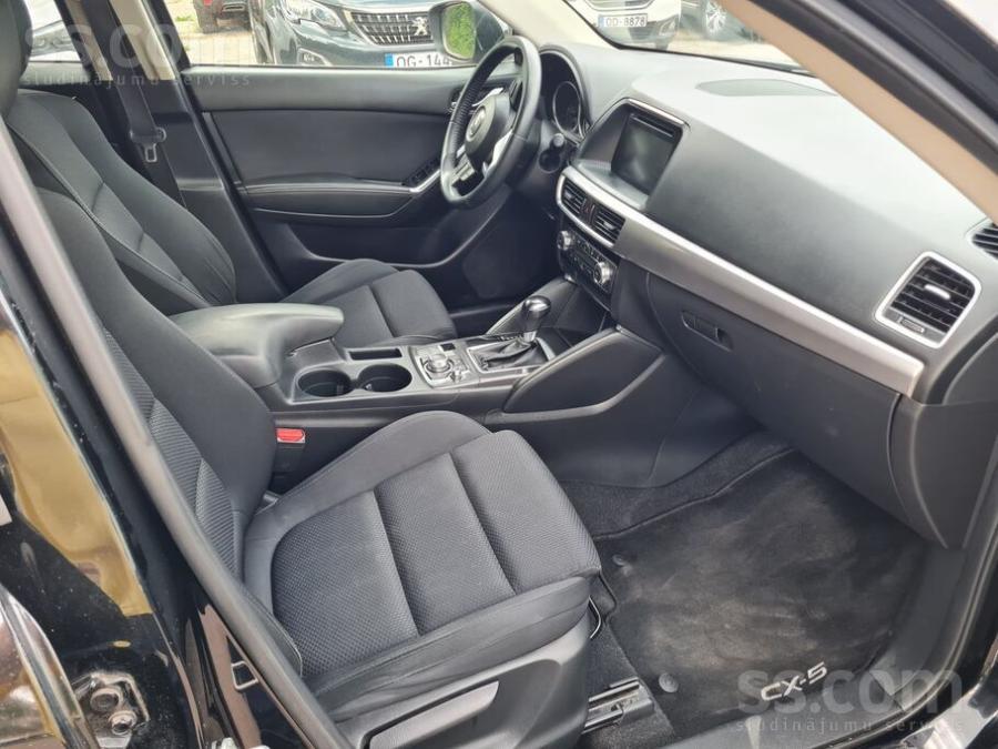 Black Mazda CX-5 2016 in Jelgava, with an engine capacity of 2.20 L and mileage of 0 thousand km for 8990 €, photo 13 on AUTOMOTO.COM.LV