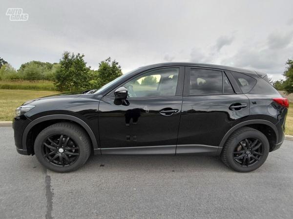 Black Mazda CX-5 2016 in Panevezys, with an engine capacity of 2.20 L and mileage of 252 thousand km for 10000 €, photo 2 on AUTOMOTO.COM.LV