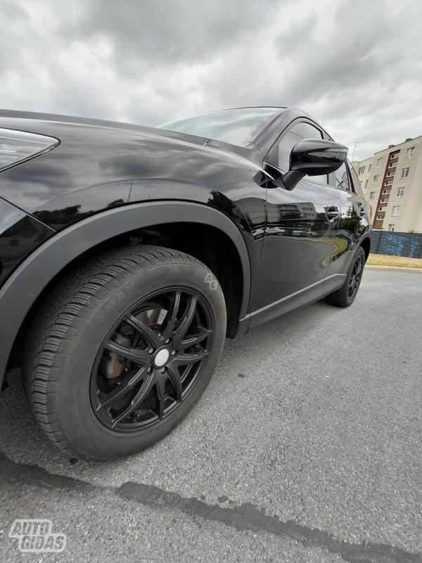 Black Mazda CX-5 2016 in Panevezys, with an engine capacity of 2.20 L and mileage of 252 thousand km for 10000 €, photo 6 on AUTOMOTO.COM.LV