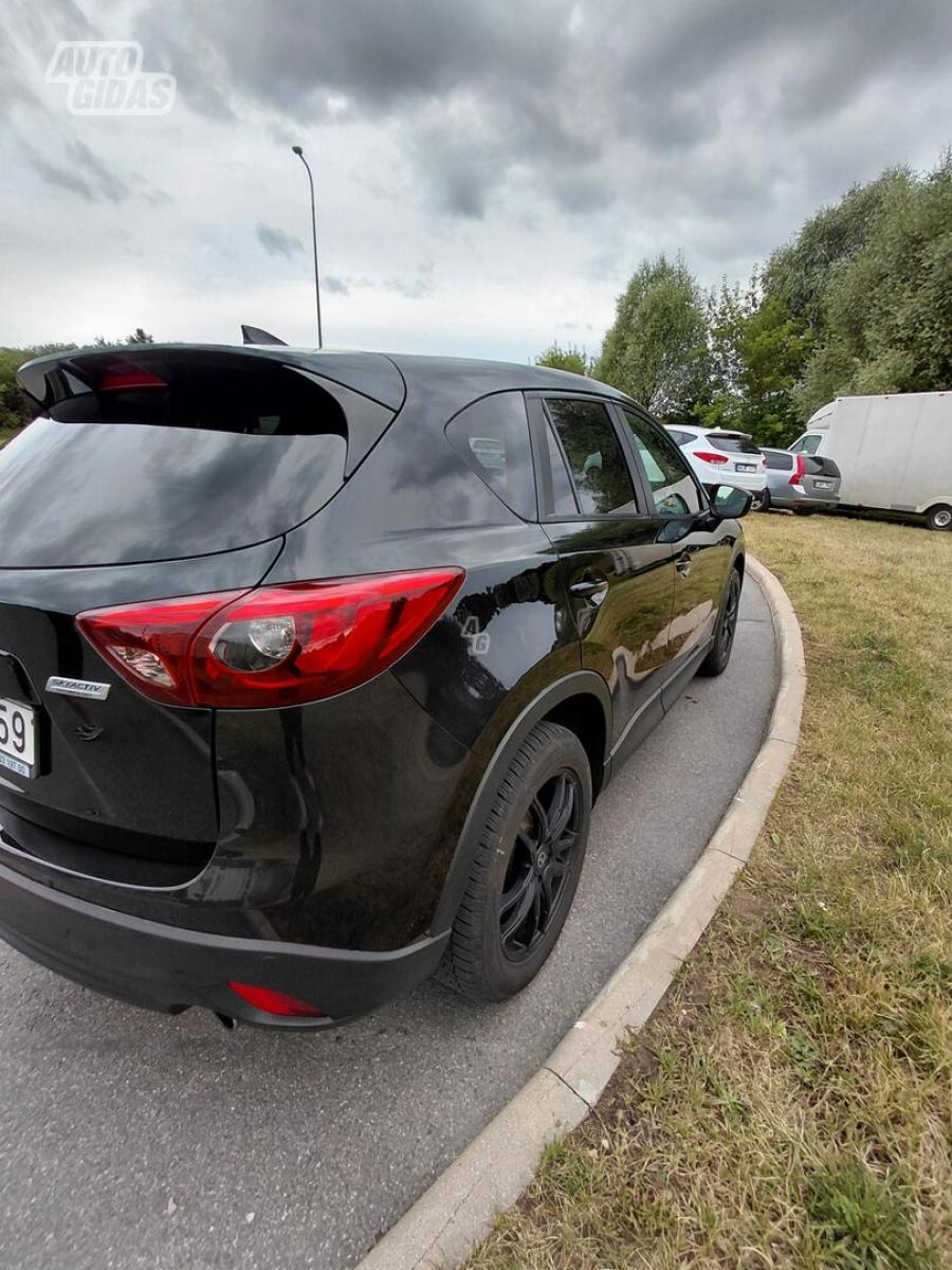 Melns Mazda CX-5 2016 Panevēža, ar dzinēja tilpumu 2.20 L un nobraukumu 252 tūkst. km par 10000 €, foto 12 vietnē AUTOMOTO.COM.LV