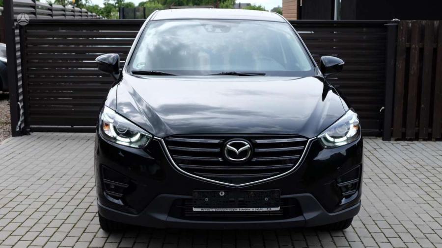 Black Mazda CX-5 2016 in Marijampole, with an engine capacity of 2.19 L and mileage of 202 thousand km for 10490 €, photo 4 on AUTOMOTO.COM.LV