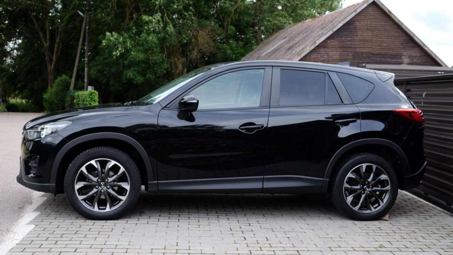 Black Mazda CX-5 2016 in Marijampole, with an engine capacity of 2.19 L and mileage of 202 thousand km for 10490 €, photo 5 on AUTOMOTO.COM.LV