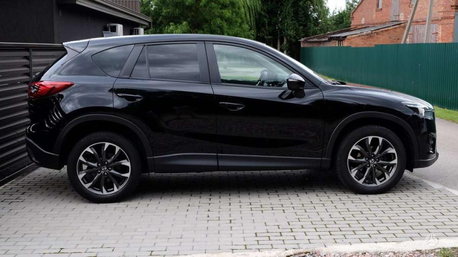 Black Mazda CX-5 2016 in Marijampole, with an engine capacity of 2.19 L and mileage of 202 thousand km for 10490 €, photo 6 on AUTOMOTO.COM.LV