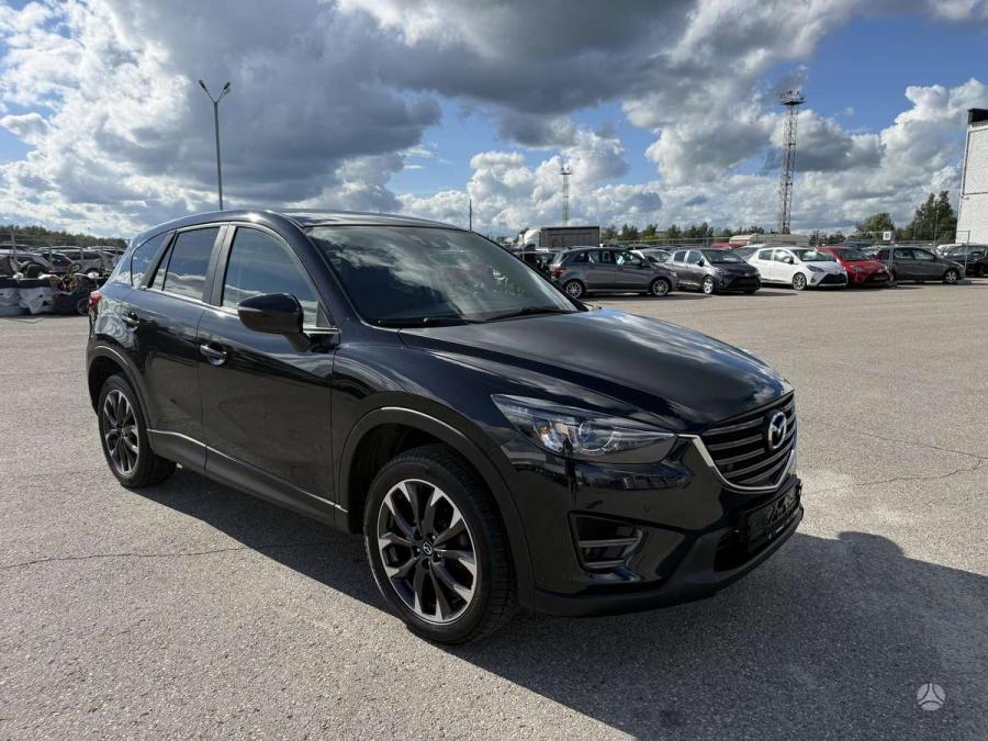 Black Mazda CX-5 2016 in Marijampole, with an engine capacity of 2.19 L and mileage of 170 thousand km for 8900 €, photo 7 on AUTOMOTO.COM.LV