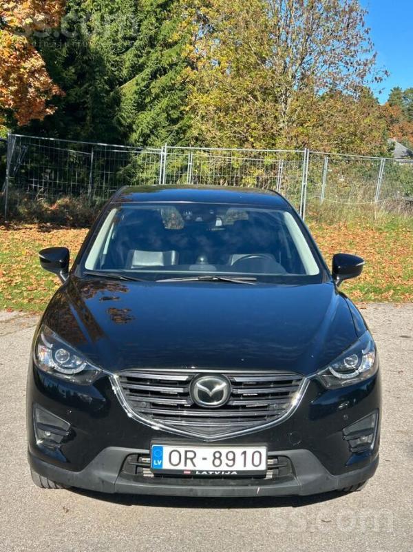 Black Mazda CX-5 2016 in Tukums, with an engine capacity of 2.20 L and mileage of 250 thousand km for 10000 €, photo 3 on AUTOMOTO.COM.LV