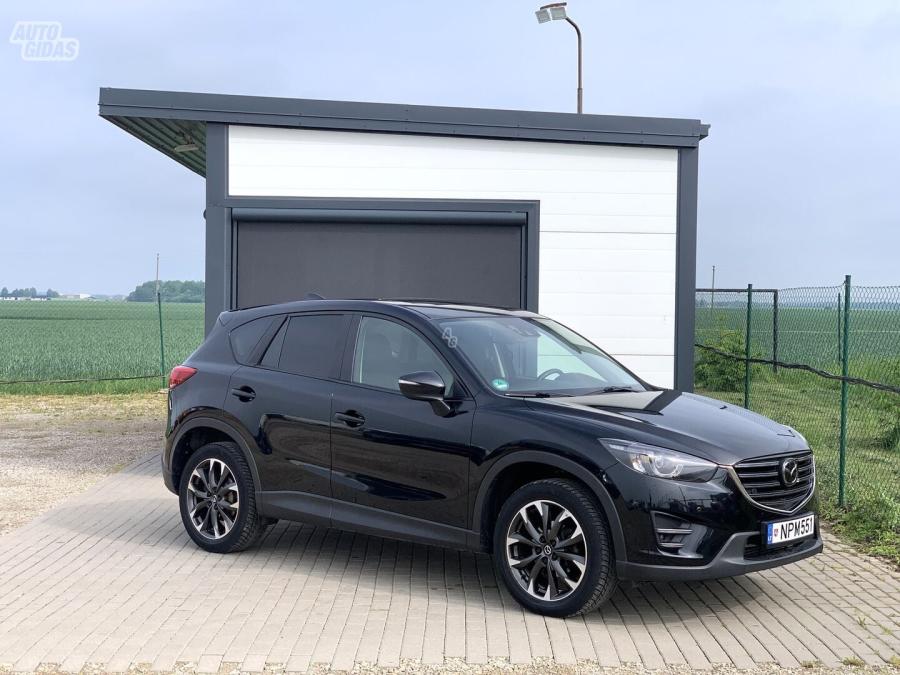 Black Mazda CX-5 2017 in Kaunas, with an engine capacity of 2.20 L and mileage of 143 thousand km for 11599 €, photo 3 on AUTOMOTO.COM.LV
