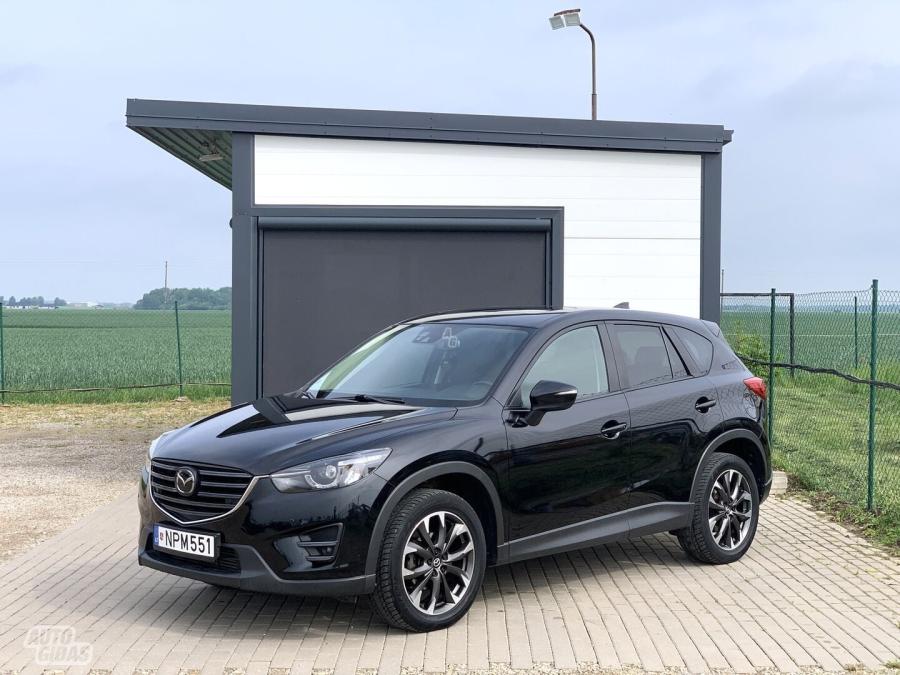 Black Mazda CX-5 2017 in Kaunas, with an engine capacity of 2.20 L and mileage of 143 thousand km for 11599 €, photo 4 on AUTOMOTO.COM.LV