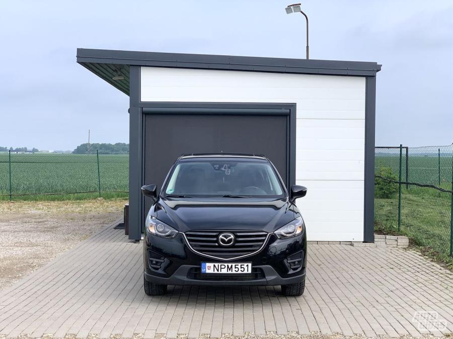 Black Mazda CX-5 2017 in Kaunas, with an engine capacity of 2.20 L and mileage of 143 thousand km for 11599 €, photo 7 on AUTOMOTO.COM.LV