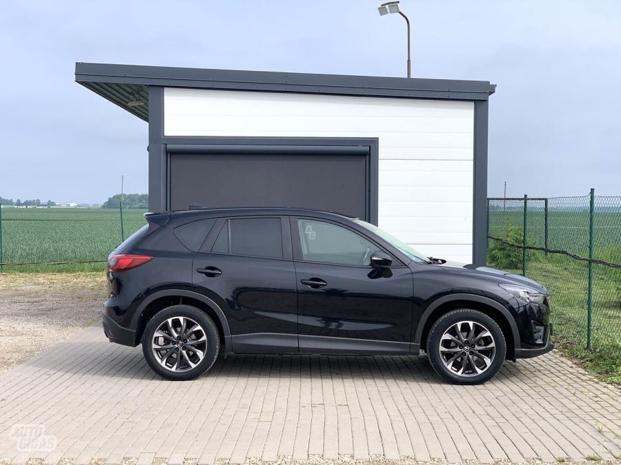Black Mazda CX-5 2017 in Kaunas, with an engine capacity of 2.20 L and mileage of 143 thousand km for 11599 €, photo 9 on AUTOMOTO.COM.LV