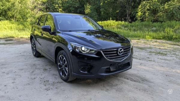 Black Mazda CX-5 2017 in Vilnius, with an engine capacity of 2.19 L and mileage of 140 thousand km for 10800 €, photo 1 on AUTOMOTO.COM.LV
