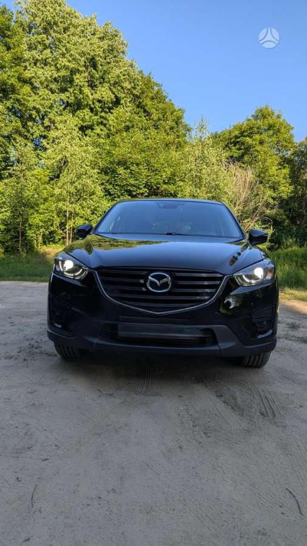 Black Mazda CX-5 2017 in Vilnius, with an engine capacity of 2.19 L and mileage of 140 thousand km for 10800 €, photo 6 on AUTOMOTO.COM.LV