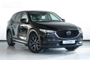 Black Mazda CX-5 2017 in Riga, with an engine capacity of 2.00 L and mileage of 153 thousand km for 15990 €, photo 3 on AUTOMOTO.COM.LV