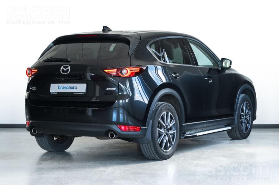 Black Mazda CX-5 2017 in Riga, with an engine capacity of 2.00 L and mileage of 153 thousand km for 15990 €, photo 5 on AUTOMOTO.COM.LV