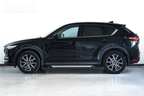 Black Mazda CX-5 2017 in Riga, with an engine capacity of 2.00 L and mileage of 153 thousand km for 15990 €, photo 5 on AUTOMOTO.COM.LV