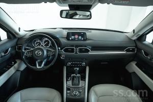 Black Mazda CX-5 2017 in Riga, with an engine capacity of 2.00 L and mileage of 153 thousand km for 15990 €, photo 7 on AUTOMOTO.COM.LV