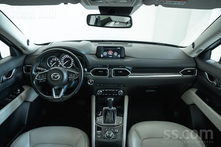 Black Mazda CX-5 2017 in Riga, with an engine capacity of 2.00 L and mileage of 153 thousand km for 15990 €, photo 7 on AUTOMOTO.COM.LV