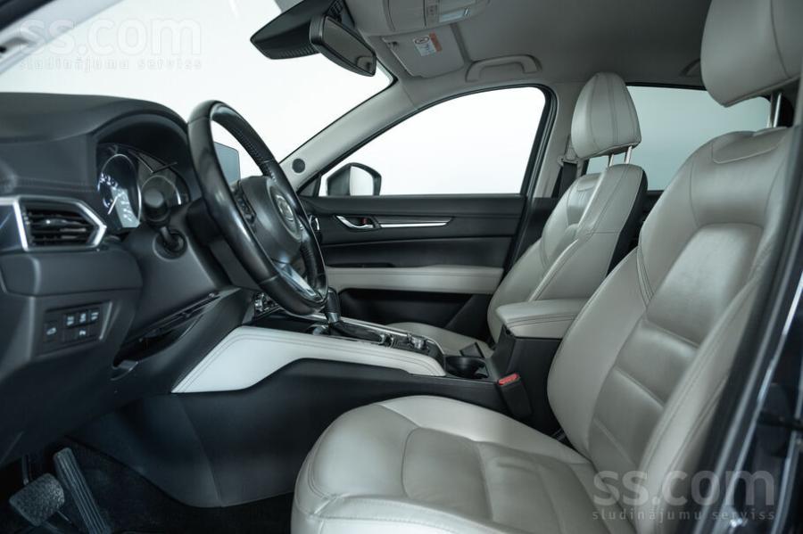 Black Mazda CX-5 2017 in Riga, with an engine capacity of 2.00 L and mileage of 153 thousand km for 15990 €, photo 13 on AUTOMOTO.COM.LV