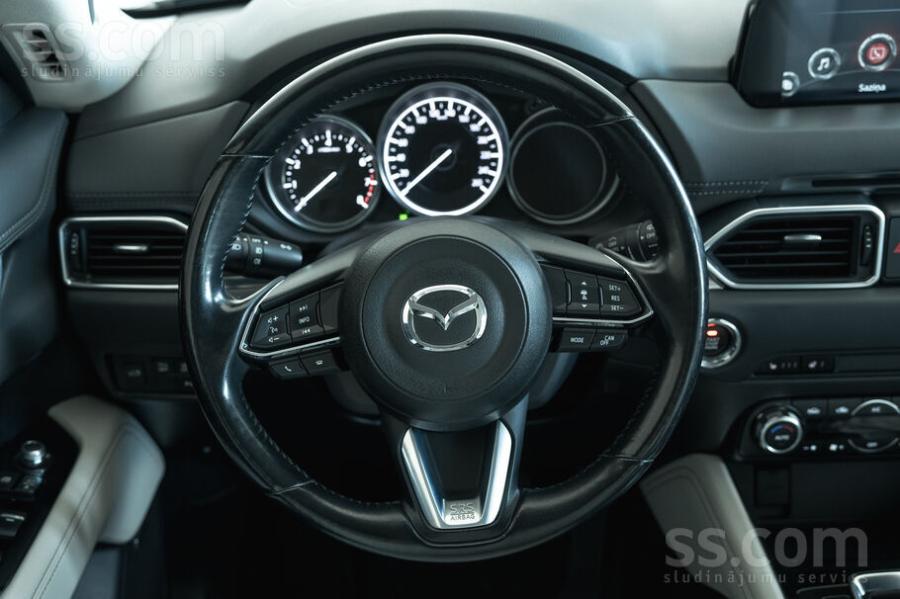 Black Mazda CX-5 2017 in Riga, with an engine capacity of 2.00 L and mileage of 153 thousand km for 15990 €, photo 16 on AUTOMOTO.COM.LV