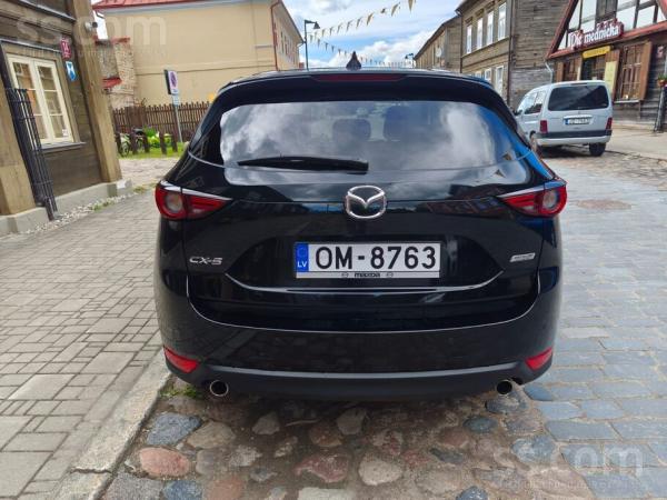 Black Mazda CX-5 2018 in Jelgava, with an engine capacity of 2.20 L and mileage of 190 thousand km for 15700 €, photo 6 on AUTOMOTO.COM.LV