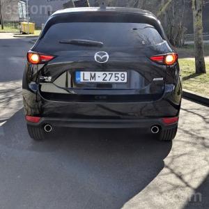 Black Mazda CX-5 2018 in Riga, with an engine capacity of 2.20 L and mileage of 89 thousand km for 16500 €, photo 5 on AUTOMOTO.COM.LV