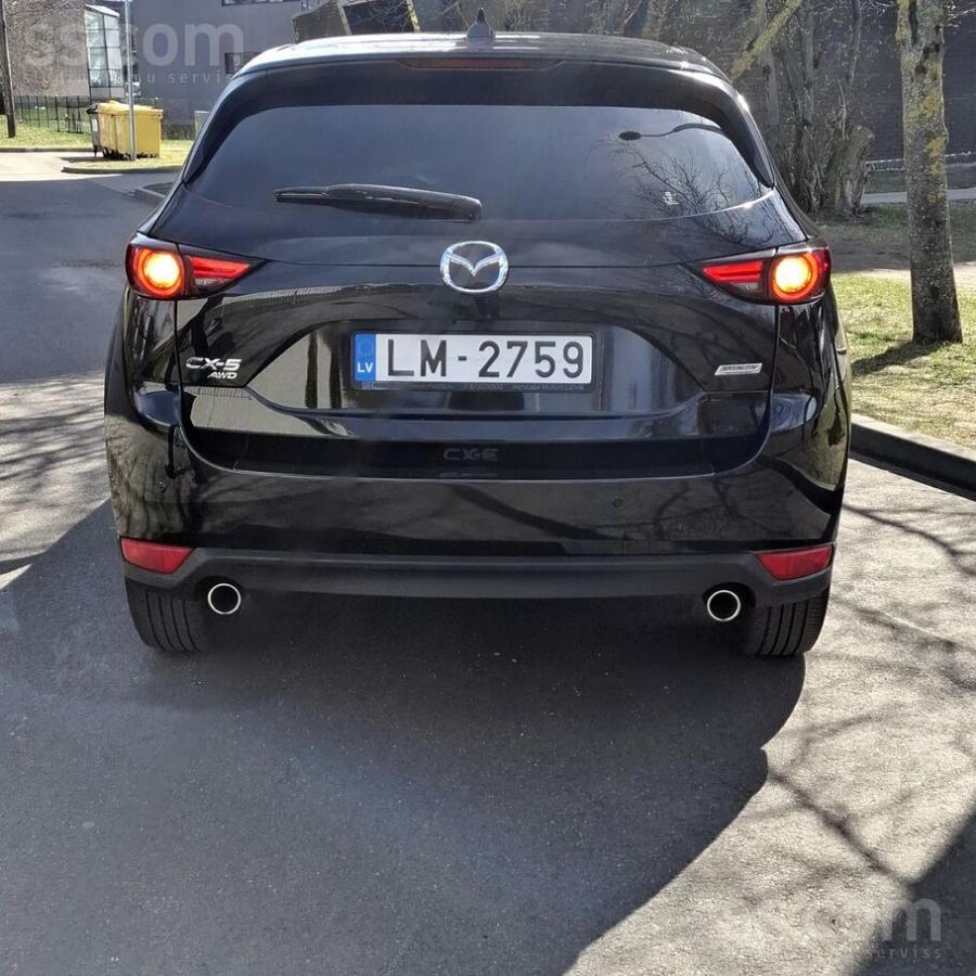 Black Mazda CX-5 2018 in Riga, with an engine capacity of 2.20 L and mileage of 89 thousand km for 16500 €, photo 4 on AUTOMOTO.COM.LV