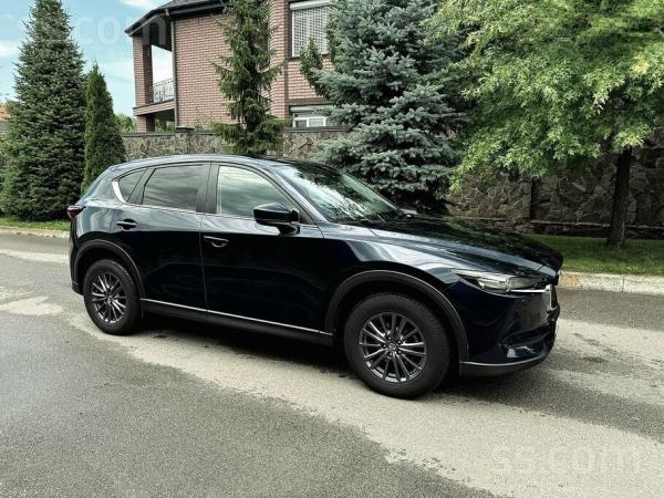 Melns Mazda CX-5 2018 Rīga, ar dzinēja tilpumu 2.20 L un nobraukumu 89 tūkst. km par 18300 €, foto 1 vietnē AUTOMOTO.COM.LV