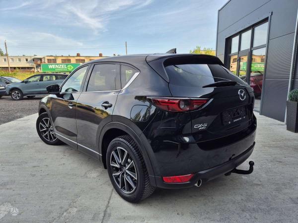 Black Mazda CX-5 2018 in Utena, with an engine capacity of 2.19 L and mileage of 220 thousand km for 12990 €, photo 4 on AUTOMOTO.COM.LV