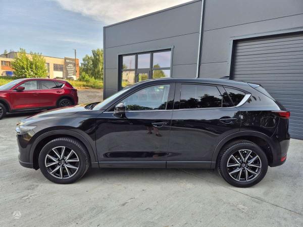 Black Mazda CX-5 2018 in Utena, with an engine capacity of 2.19 L and mileage of 220 thousand km for 12990 €, photo 5 on AUTOMOTO.COM.LV