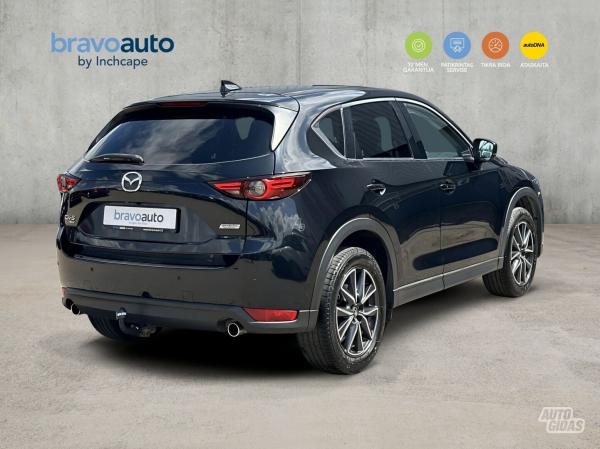 Mazda CX-5 2018 in Kaunas on AUTOMOTO.COM.LV Black Mazda CX-5 2018 in Kaunas, with an engine capacity of 2.50 L and mileage of 123 thousand km for 18999 €, photo 7 on AUTOMOTO.COM.LV