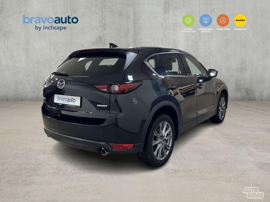 Black Mazda CX-5 2021 in Vilnius, with an engine capacity of 2.00 L and mileage of 61 thousand km for 23990 €, photo 5 on AUTOMOTO.COM.LV