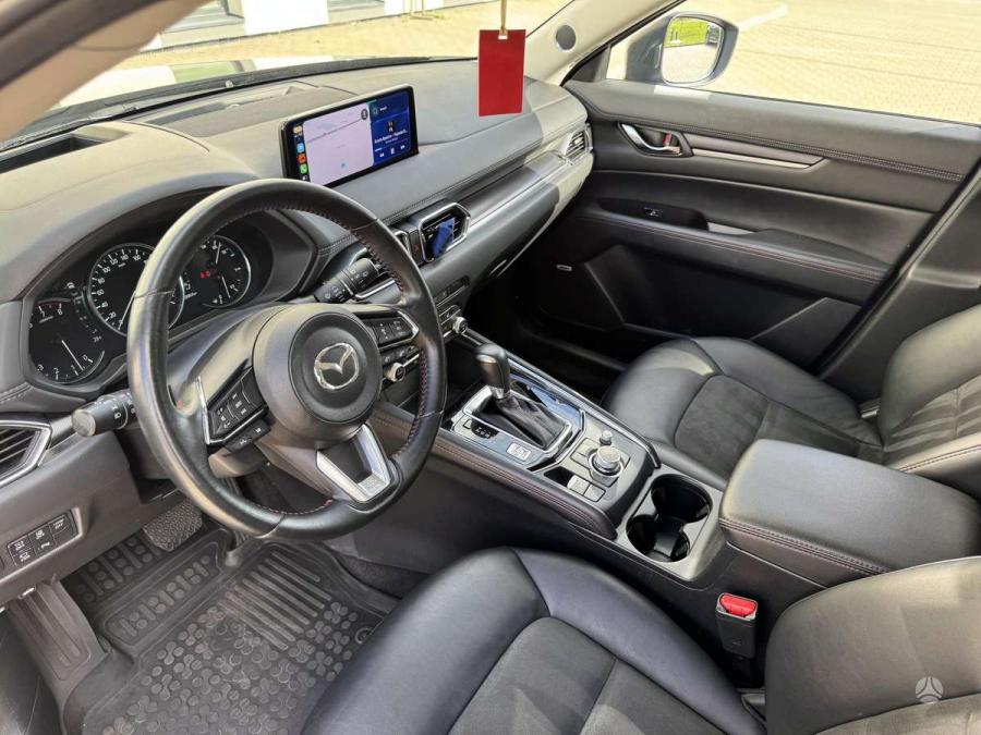 Black Mazda CX-5 2021 in Vilnius, with an engine capacity of 2.49 L and mileage of 90 thousand km for 25500 €, photo 18 on AUTOMOTO.COM.LV