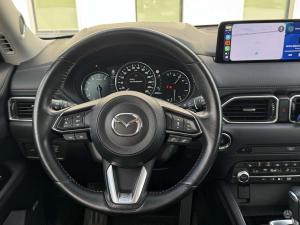Black Mazda CX-5 2021 in Vilnius, with an engine capacity of 2.49 L and mileage of 90 thousand km for 25500 €, photo 24 on AUTOMOTO.COM.LV