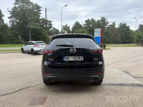 Black Mazda CX-5 2022 in Jekabpils, with an engine capacity of 2.00 L and mileage of 64 thousand km for 18500 €, photo 5 on AUTOMOTO.COM.LV