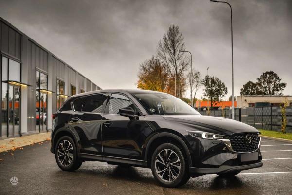 Black Mazda CX-5 2023 in Kaunas, with an engine capacity of 2.19 L and mileage of 142 thousand km for 19900 €, photo 4 on AUTOMOTO.COM.LV