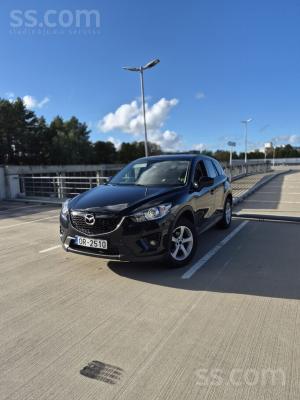 Melns Mazda CX-5 2014 Rīga, ar dzinēja tilpumu 2.20 L un nobraukumu 216 tūkst. km par 7990 €, foto  vietnē AUTOMOTO.COM.LV