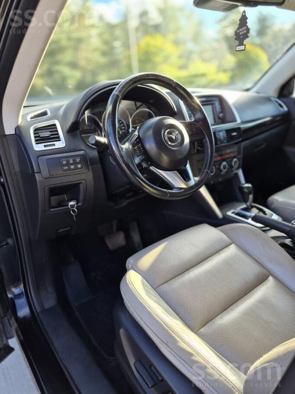 Melns Mazda CX-5 2014 Rīga, ar dzinēja tilpumu 2.20 L un nobraukumu 216 tūkst. km par 7990 €, foto 8 vietnē AUTOMOTO.COM.LV