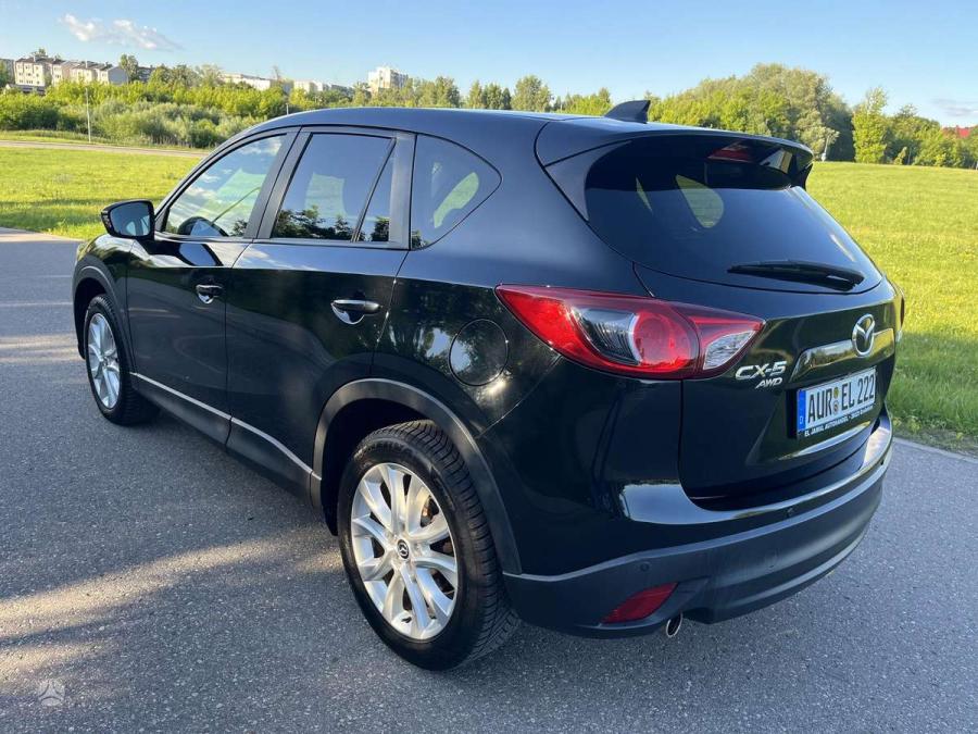 Black Mazda CX-5 2013 in Vilnius, with an engine capacity of 2.20 L and mileage of 234 thousand km for 7350 €, photo 4 on AUTOMOTO.COM.LV
