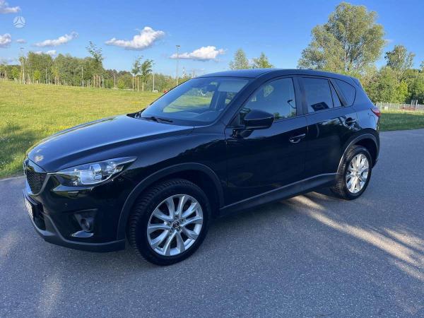 Black Mazda CX-5 2013 in Vilnius, with an engine capacity of 2.20 L and mileage of 234 thousand km for 7350 €, photo 4 on AUTOMOTO.COM.LV